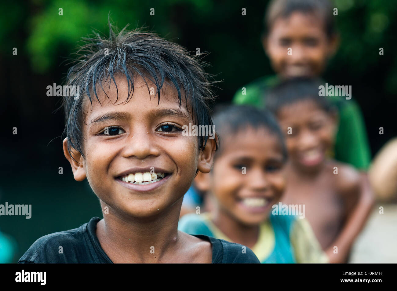 Boy at jetty pero sumba indonesia Stock Photo - Alamy
