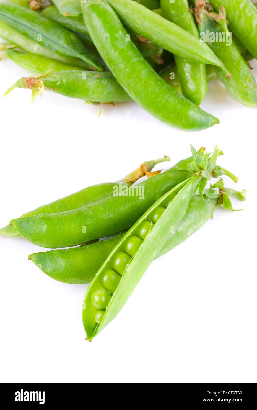 Ripe pea vegetable with green leaf isolated on white background Stock ...
