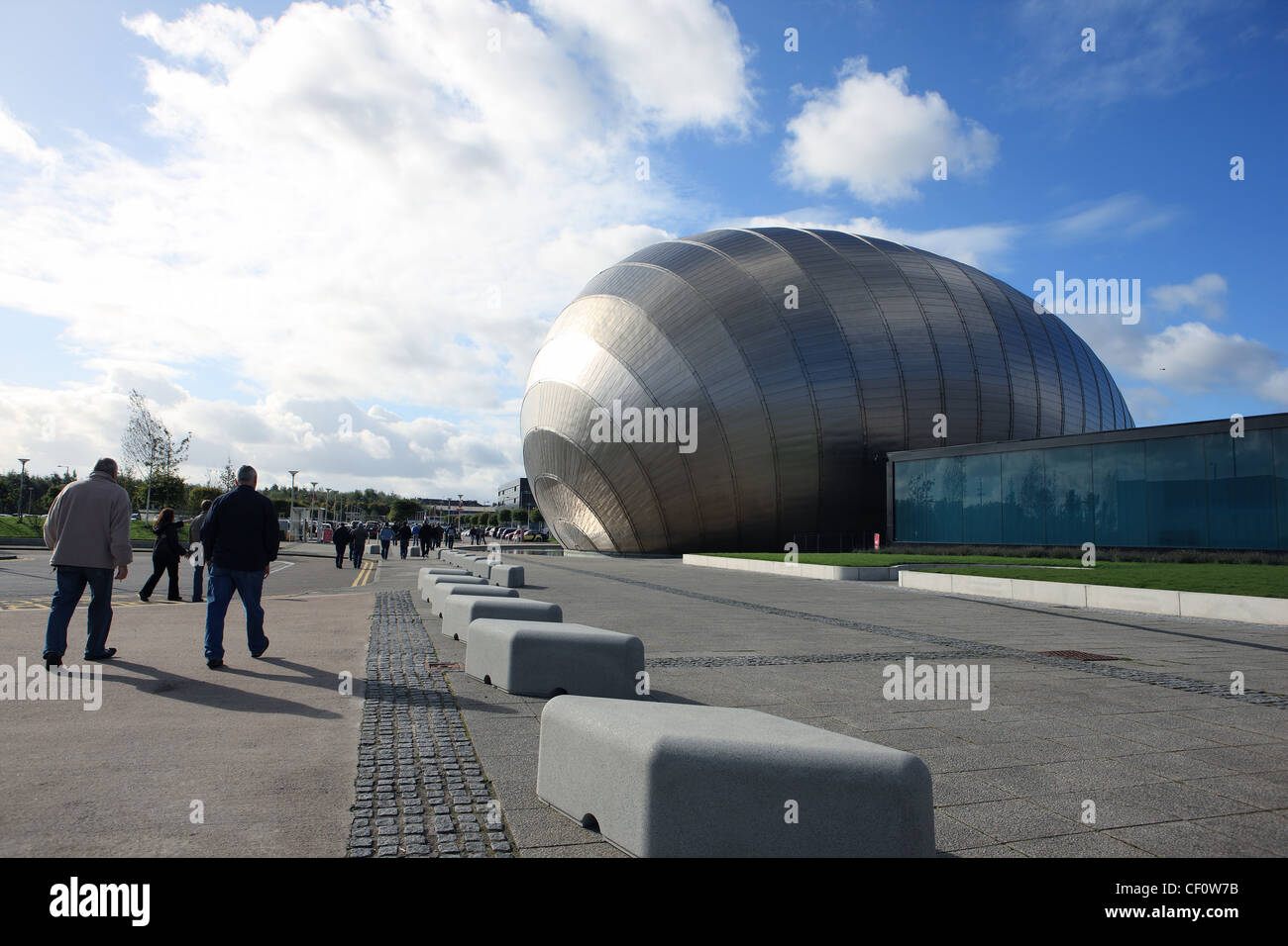 People walking towards the Science Centre in Glasgow Stock Photo - Alamy