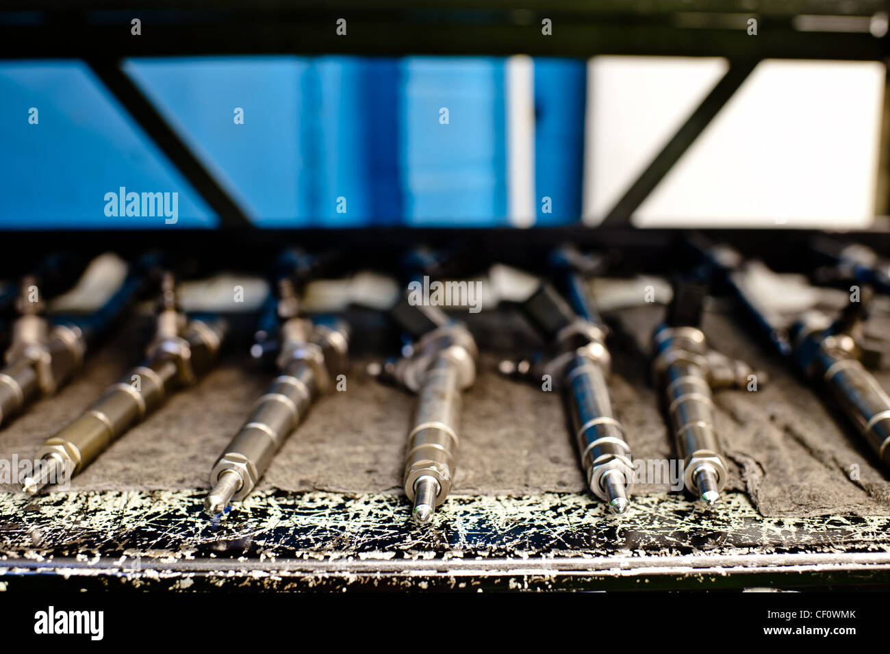 Fuel diesel injectors laying out for repair Stock Photo - Alamy