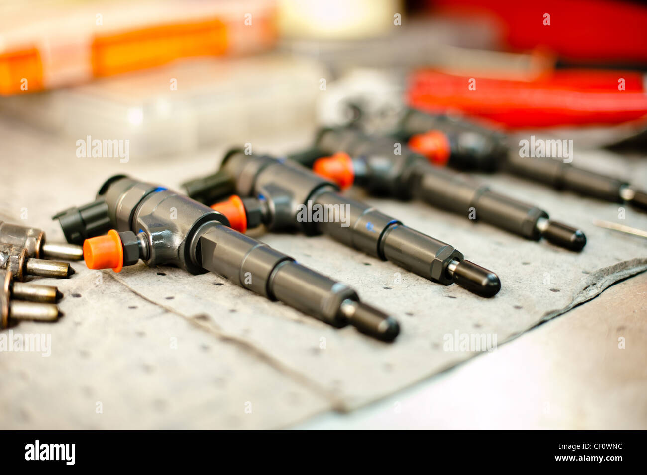 Fuel diesel injectors laying out for repair Stock Photo - Alamy