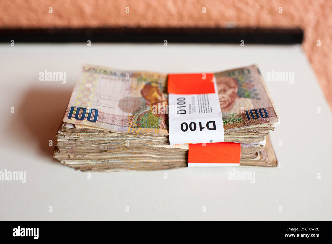 Money piled up hi-res stock photography and images - Alamy