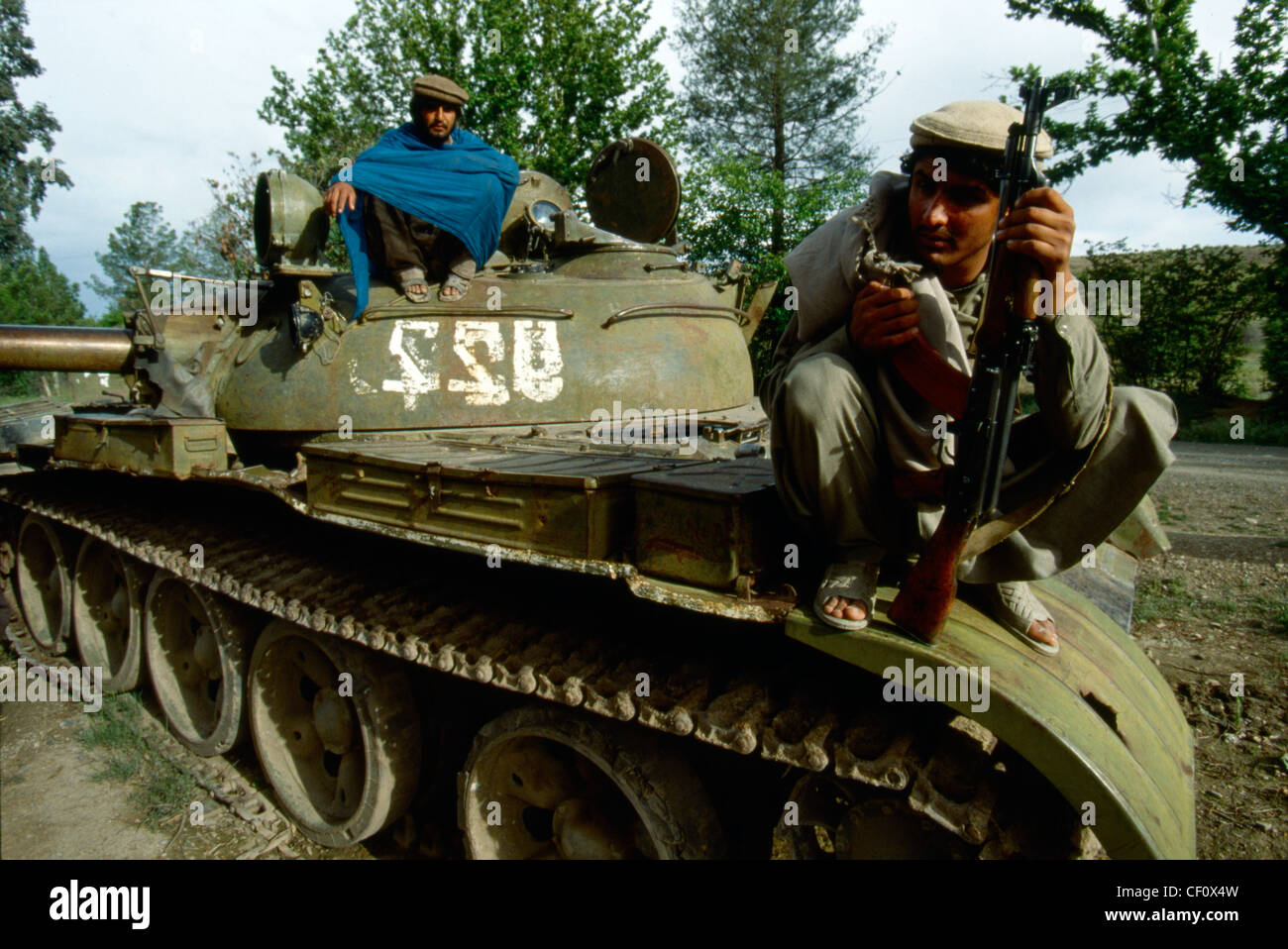 Mujahedin on a tanks Stock Photo - Alamy