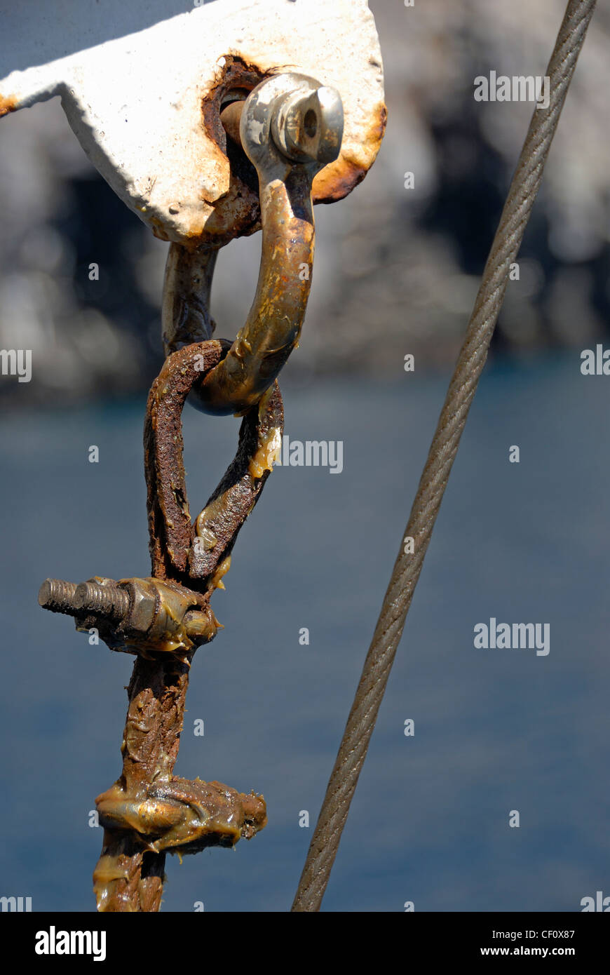 Rusty chain with grease on boat, Wolf (or Wenman) Island, Galapagos ...