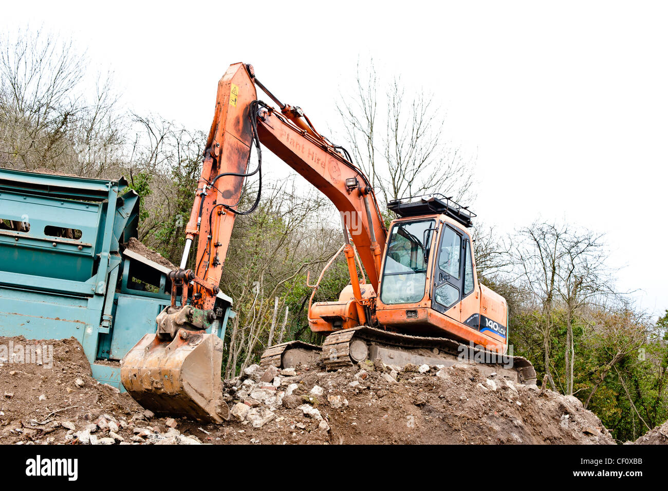 Orange digger hi-res stock photography and images - Alamy