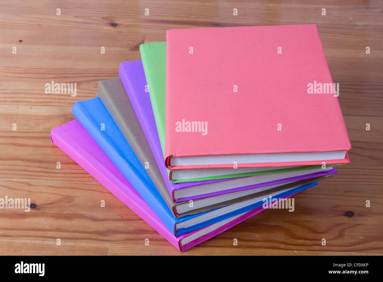 Stack of colorful real books Stock Photo - Alamy