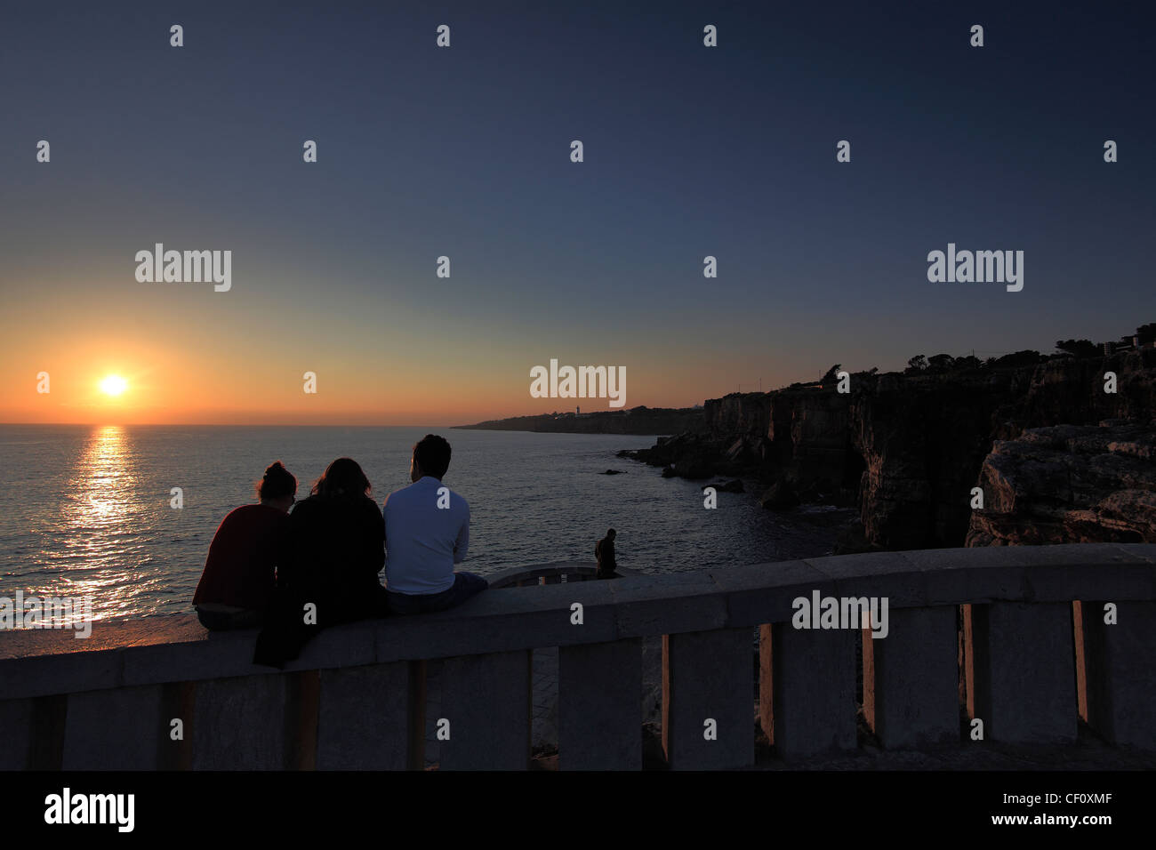 Sunset over the Atlantic at Boca do Inferno caves near Cascais town ...
