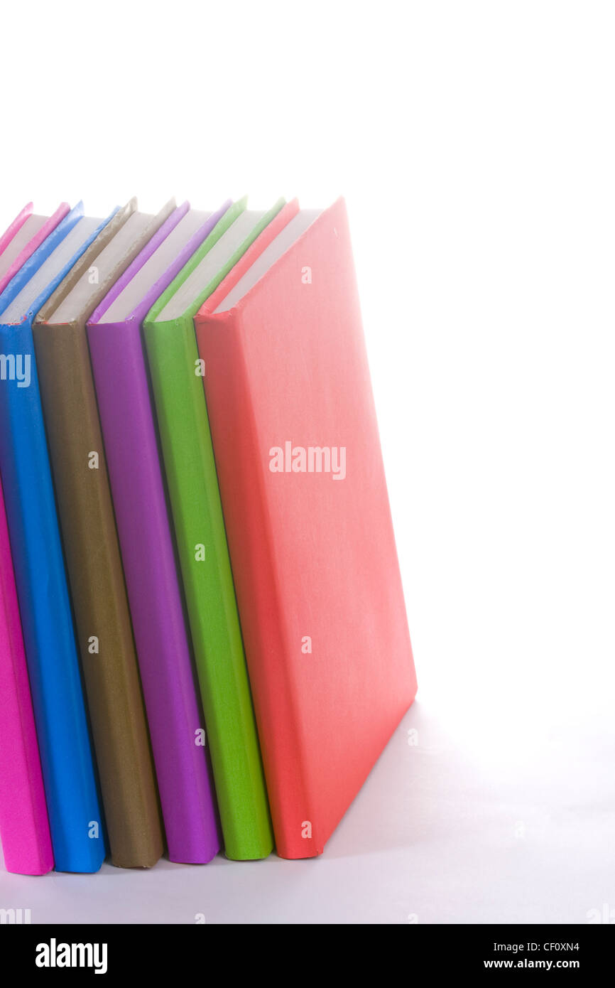 Stack of colorful real books on white Stock Photo - Alamy