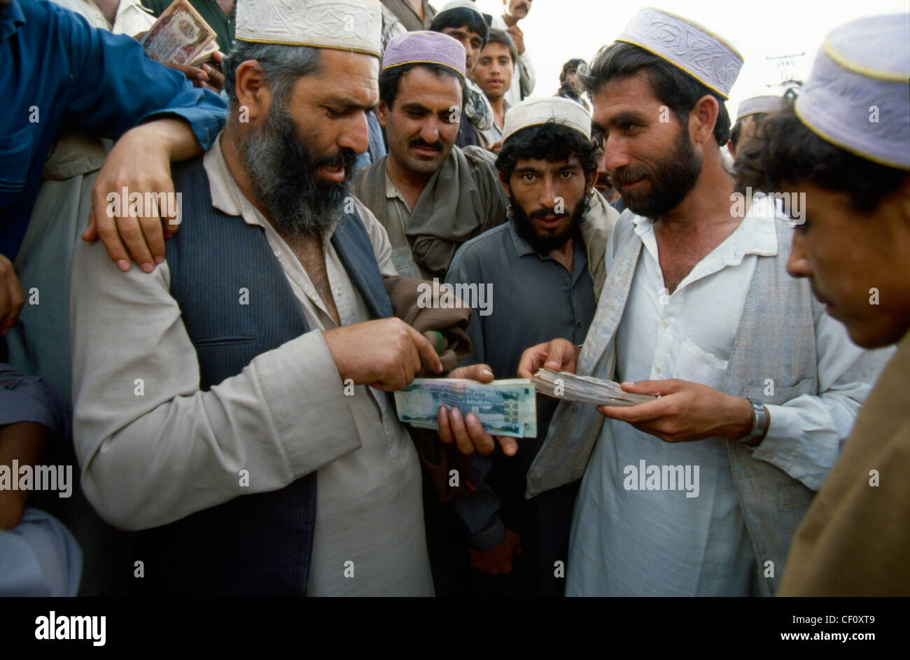 Money exchanger on the border in Afghanistan Stock Photo - Alamy