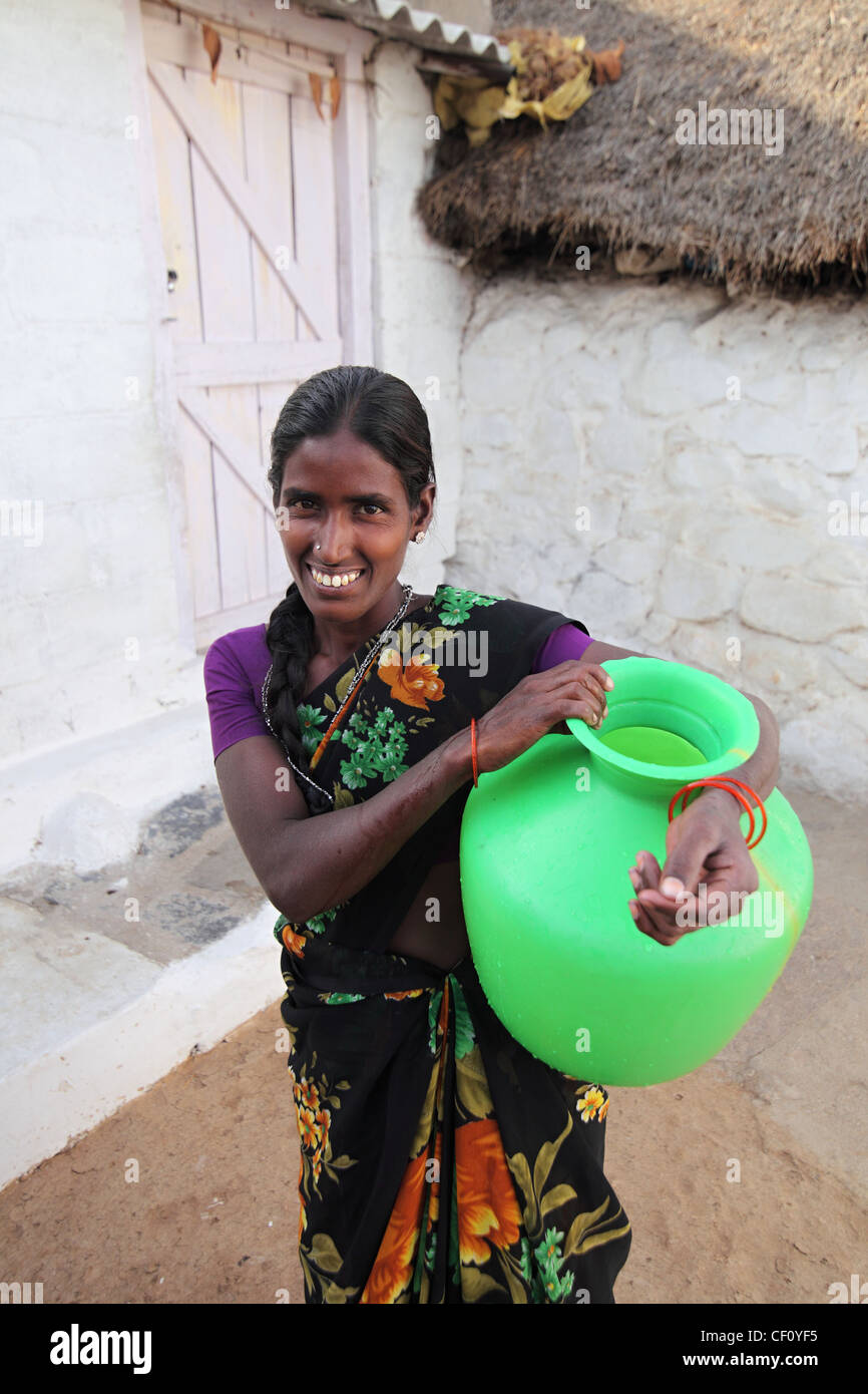 Rural woman holding a water pot Andhra Pradesh South India Stock Photo ...