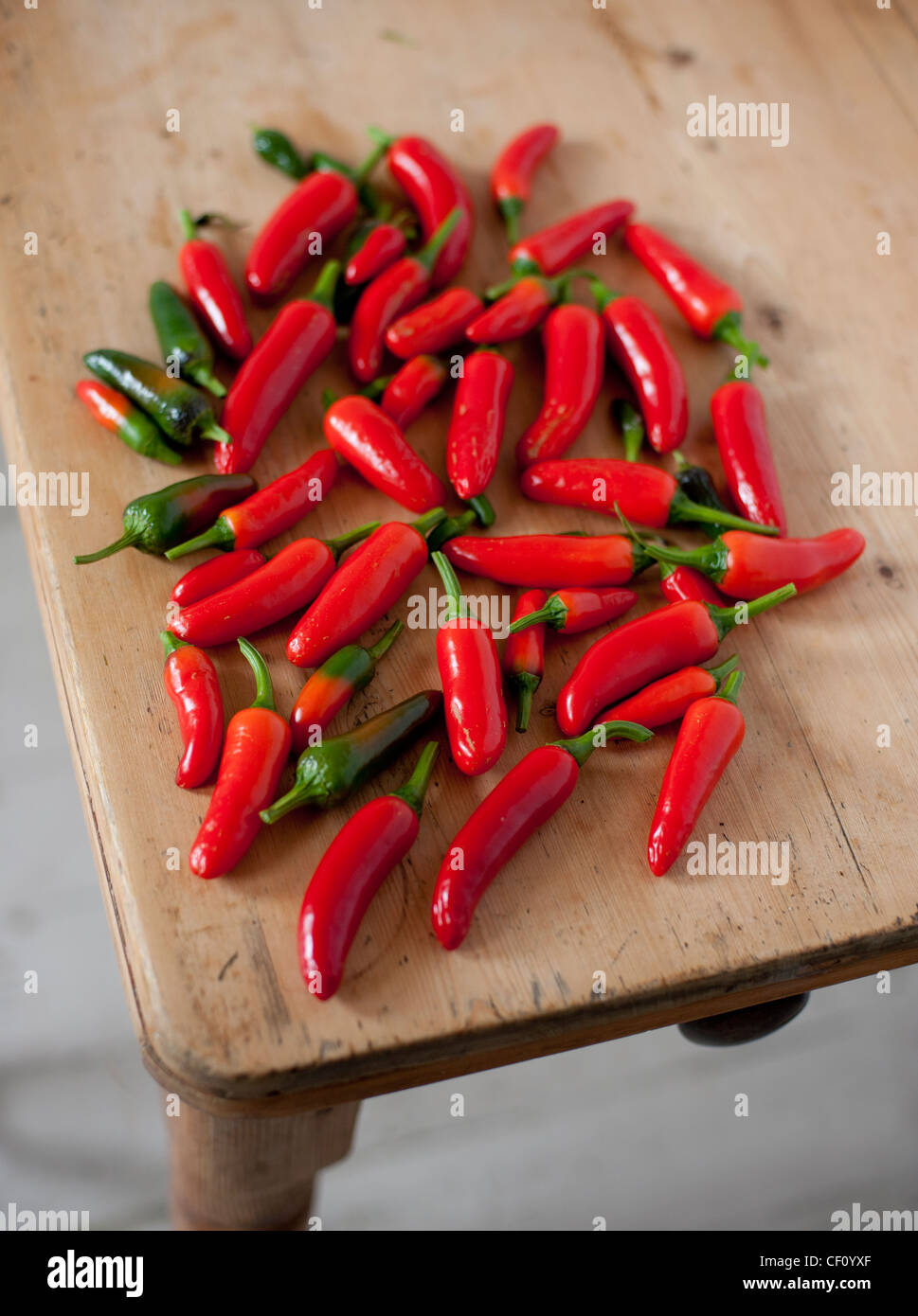 red chillies on table top Stock Photo - Alamy