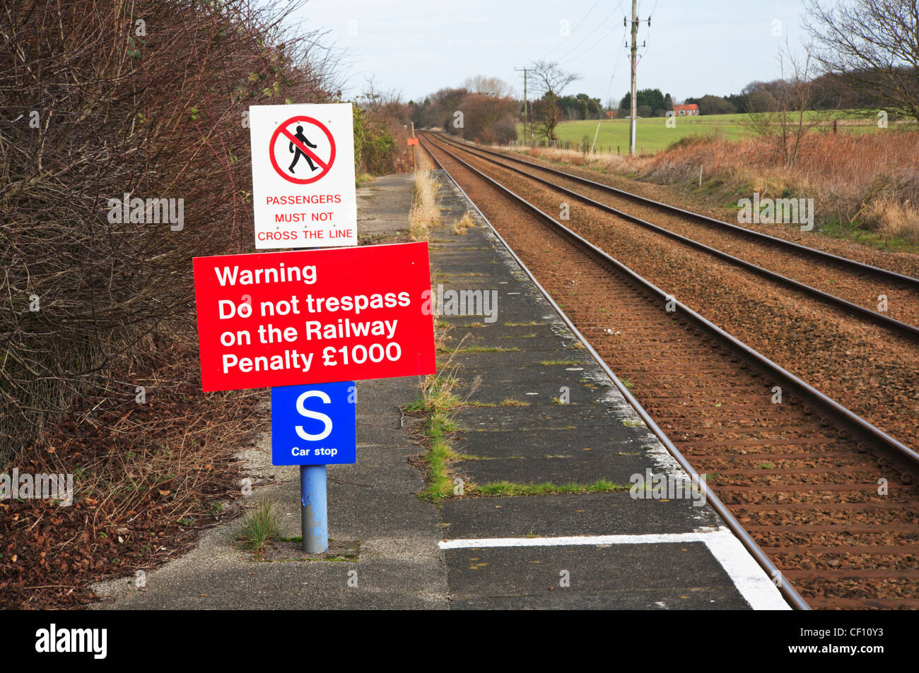 Halt Stop Sign For Railway Passengers At The End Of A Danger Sign