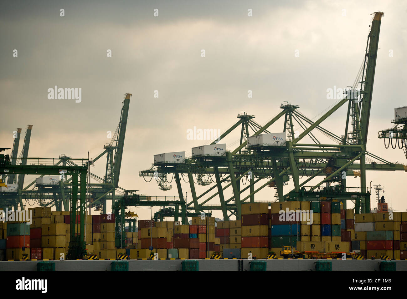 Cargo containers are seen stacked at the Pasir Panjang terminal of the ...