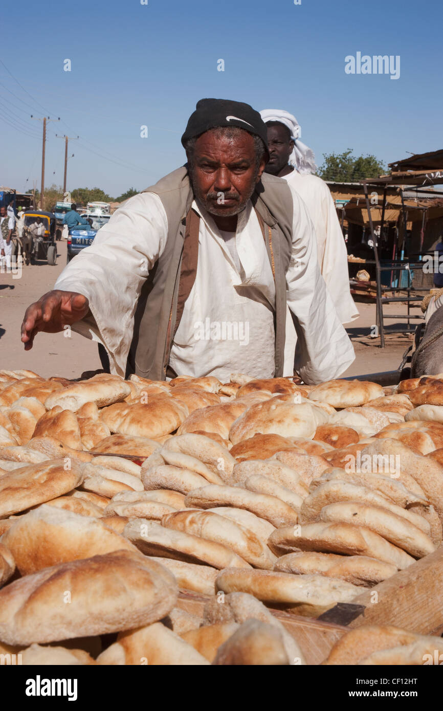 Traditional Bread seller in the market of karima Stock Photo - Alamy
