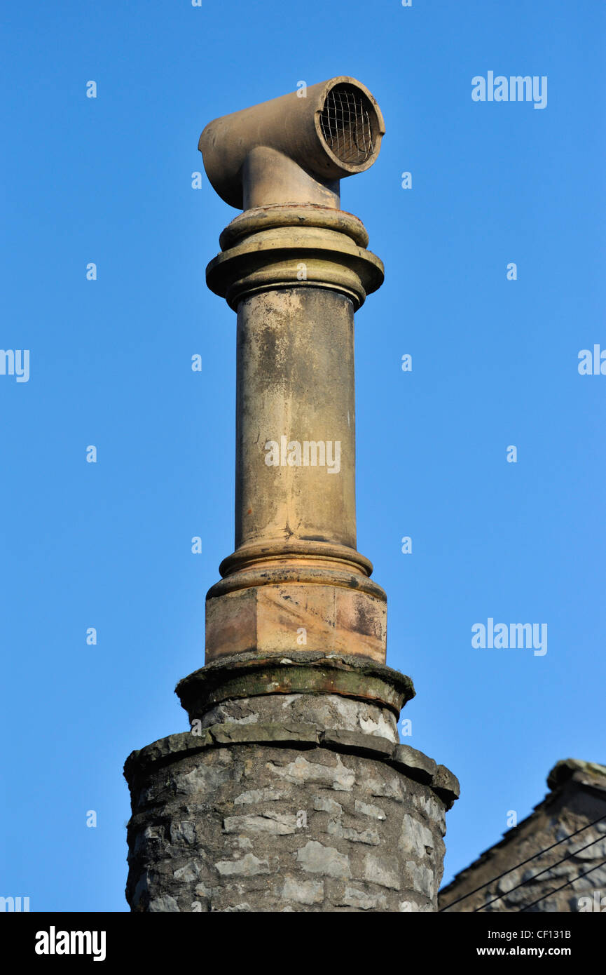 Cylindrical stone chimney stack with one pot. Castle Street, Kendal ...