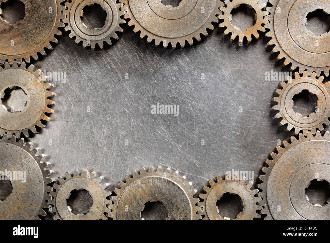 Background image made of steel and old cog wheels Stock Photo - Alamy