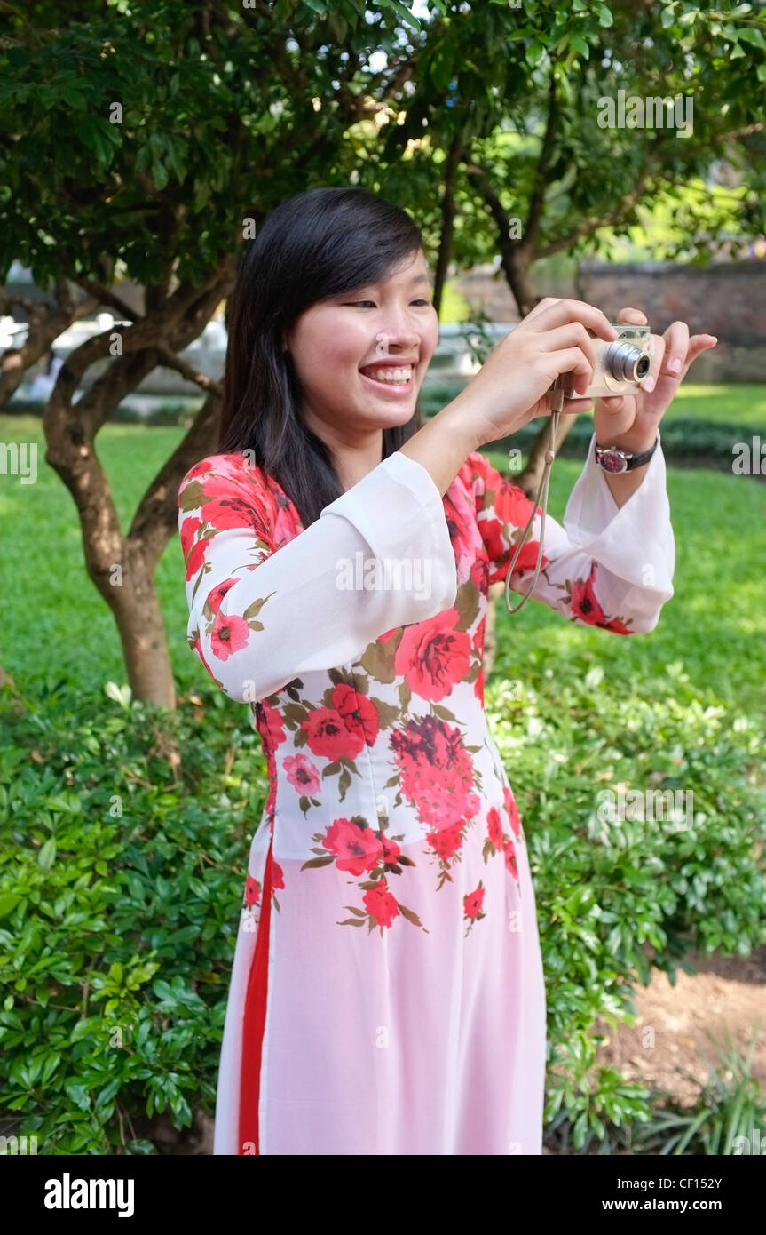 College student girl with Ao Dai dress taking pictures, Hanoi, Vietnam ...