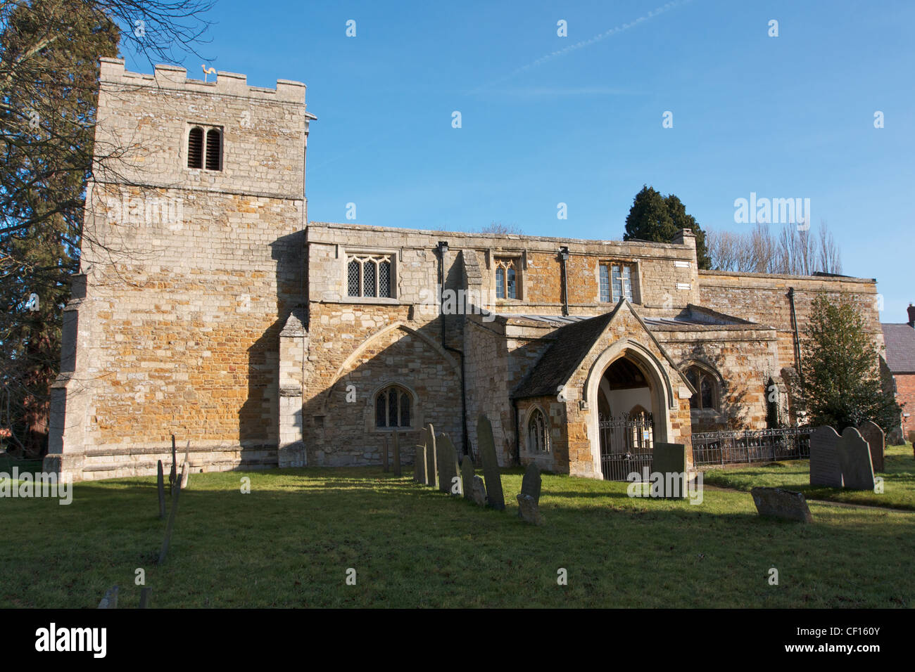 Lubenham Church lit by the morning sun Stock Photo - Alamy