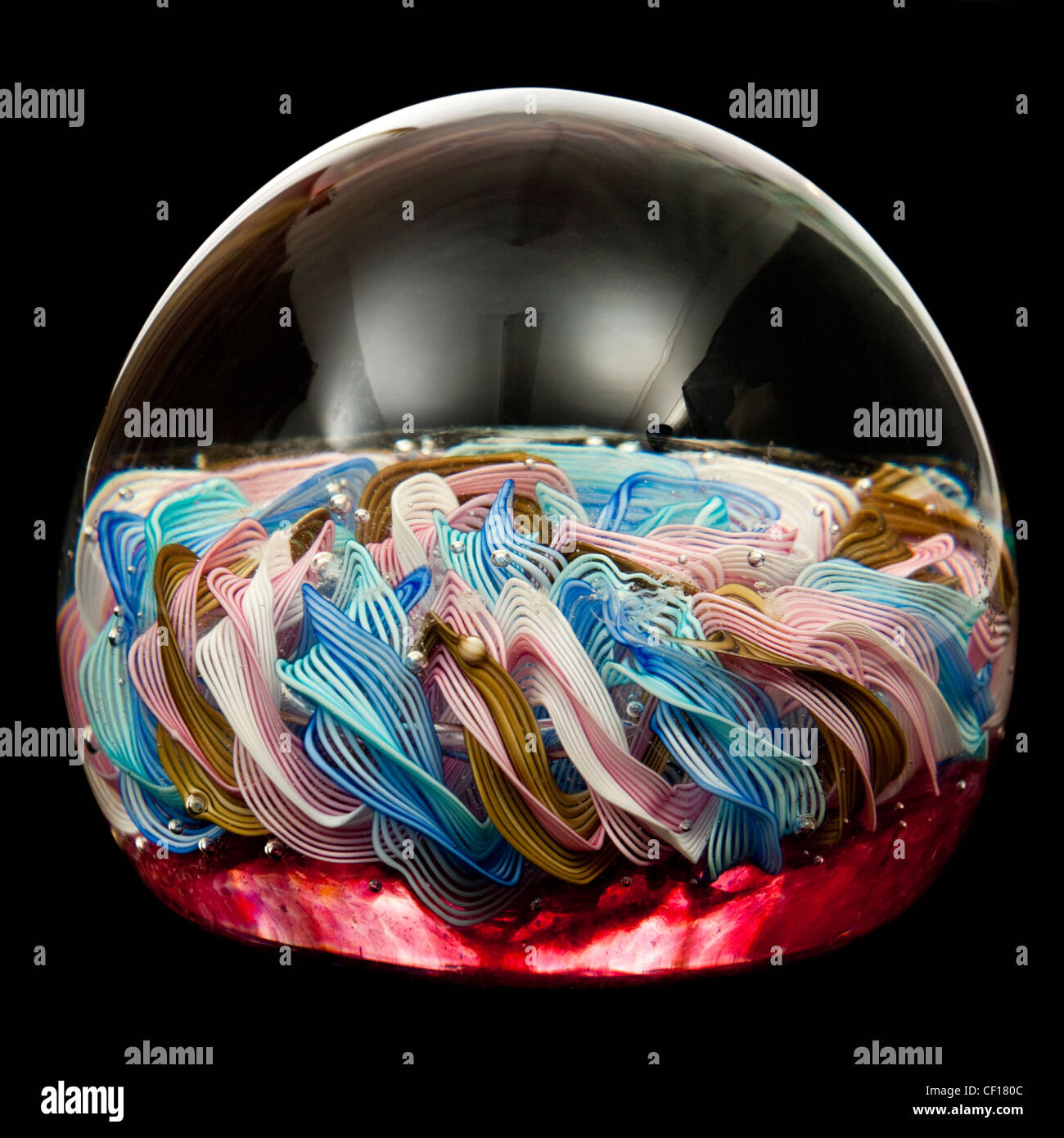 Domed Italian Murano glass cotton twist paperweight Stock Photo - Alamy