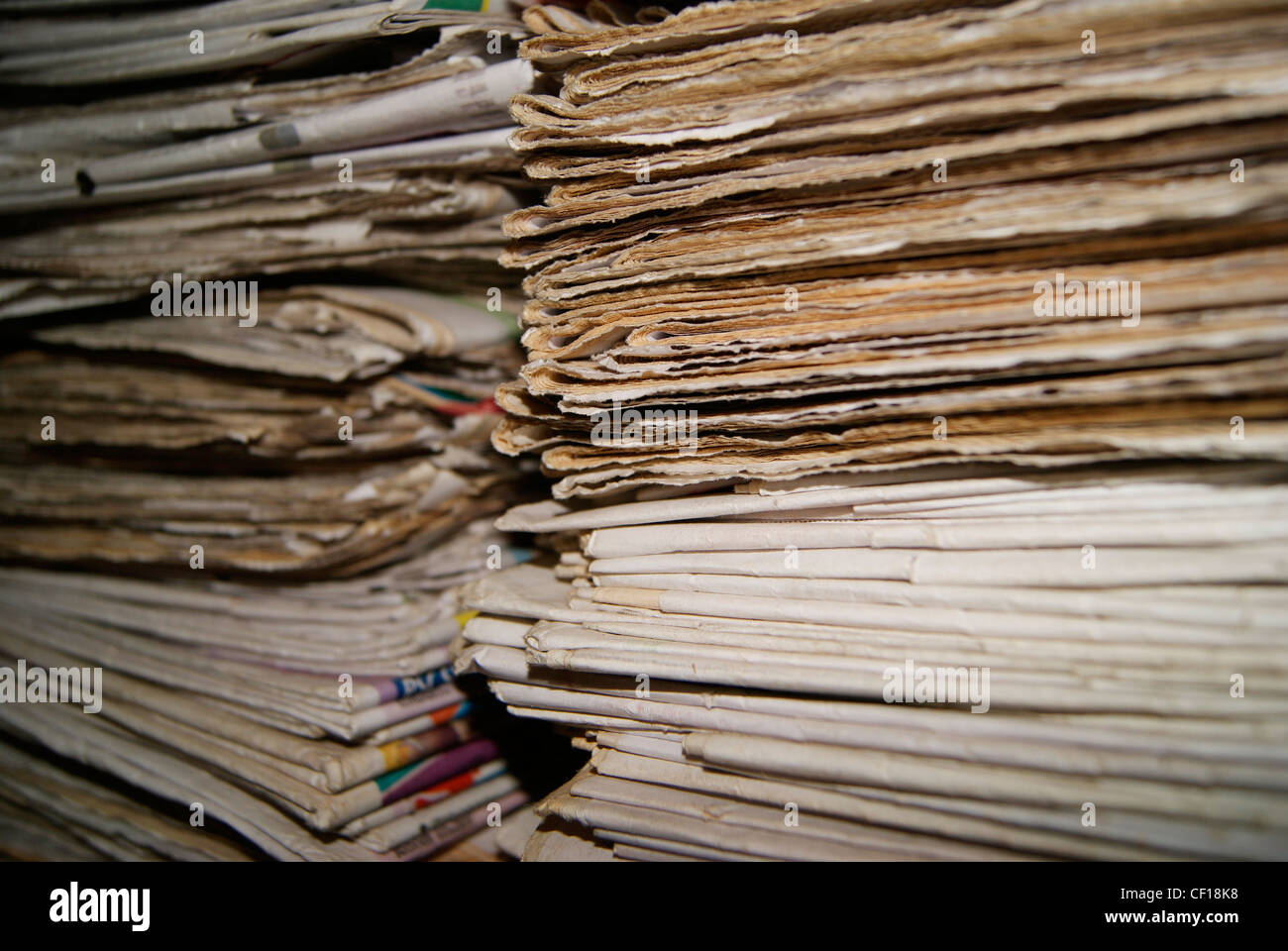 Old Newspapers arranged in the Library shelf Stock Photo - Alamy