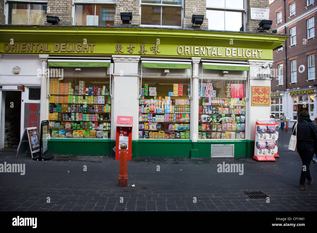 Shop window in Chinatown, London, with a range of Chinese teas, herbs ...