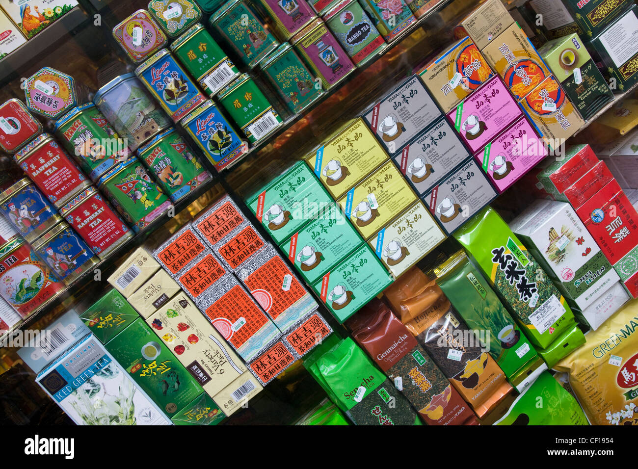 Shop window in Chinatown, London, with a range of Chinese teas, herbs ...