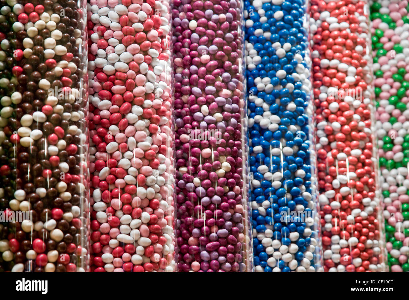 Tubes full of M&M sweets in dispensers inside M&M's world near ...
