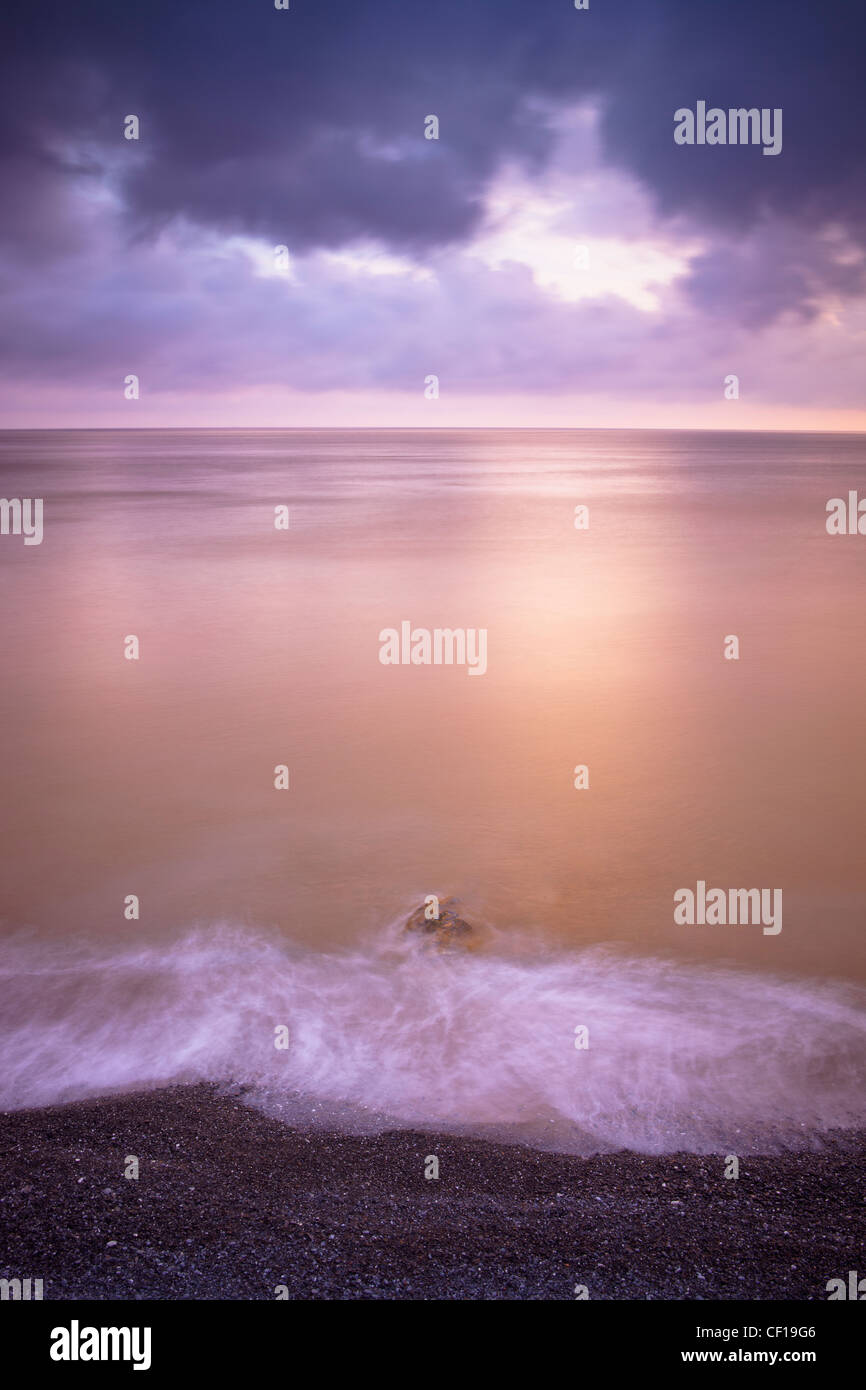 Water lapping onto rocks hi-res stock photography and images - Alamy