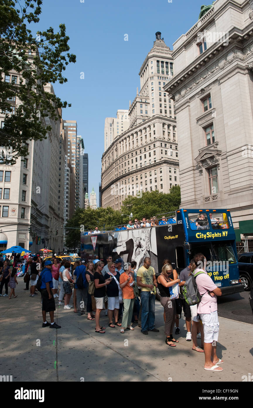 People queuing to ride on tour bus around New York, USA Stock Photo - Alamy