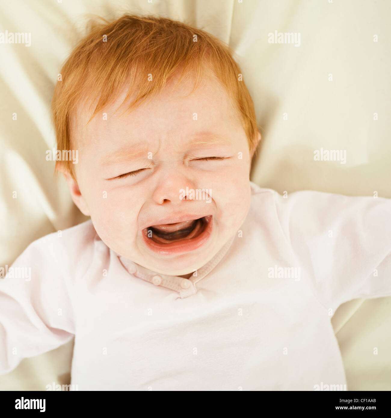 Crying Caucasian baby girl Stock Photo - Alamy