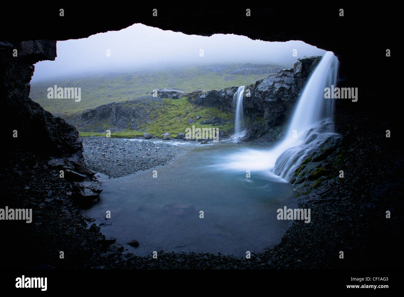 Waterfall viewed from inside cave hi-res stock photography and images ...