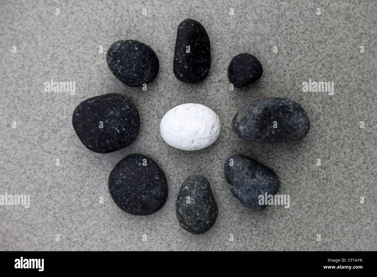 9 stones stands in circle like a sun. It's a Zen visual on rough ...