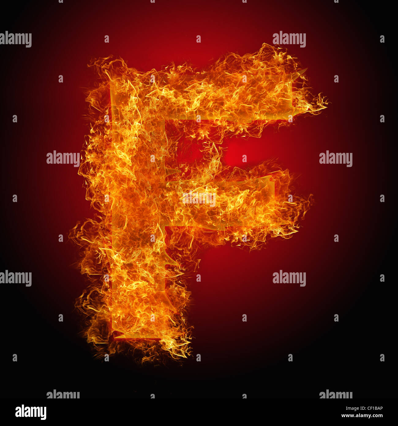 Fire letter F on a black background Stock Photo - Alamy