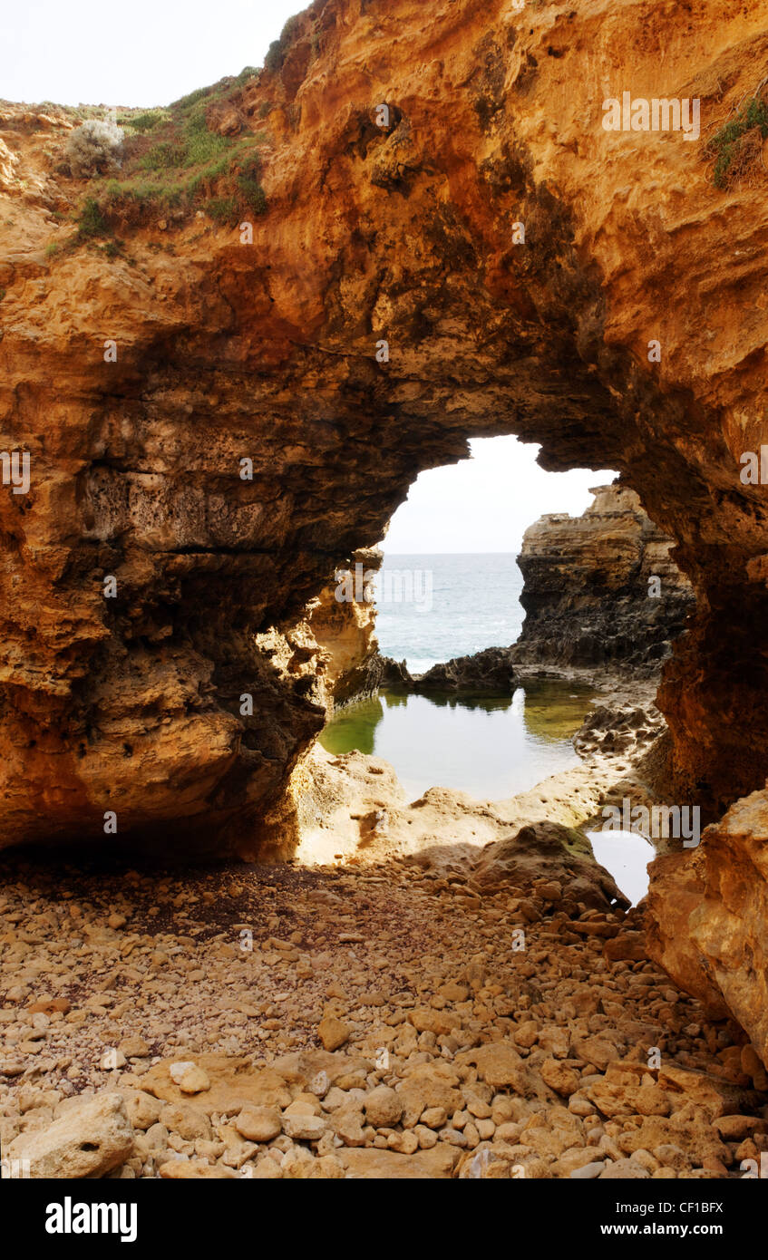 Looking through a sea arch on the Australian Great Ocean Road Stock ...