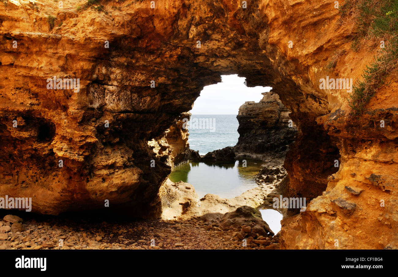 Looking through a sea arch on the Australian Great Ocean Road Stock ...