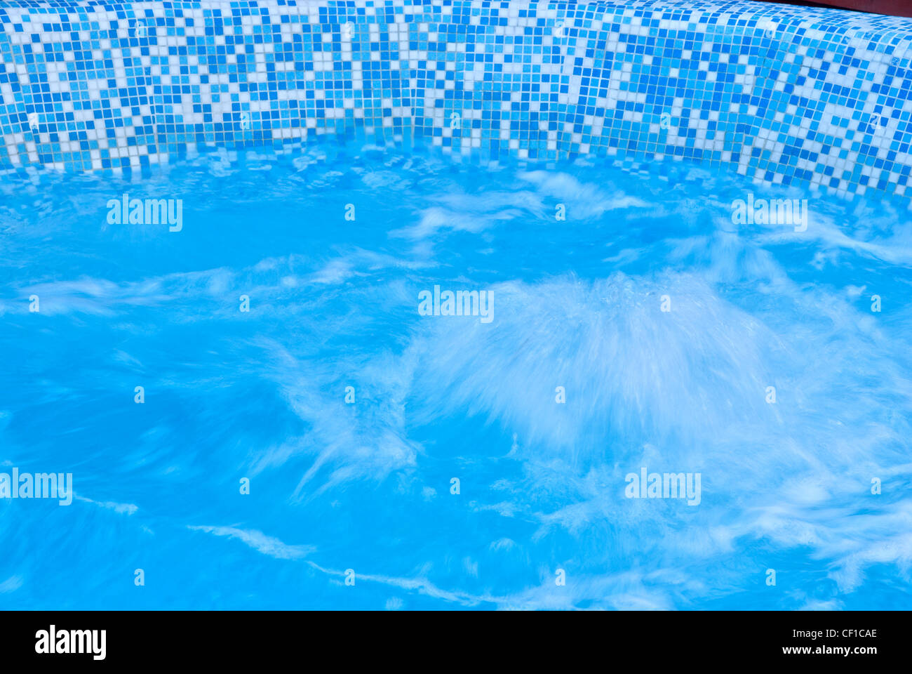 Abstract blue water background of hot whirlpool Stock Photo - Alamy