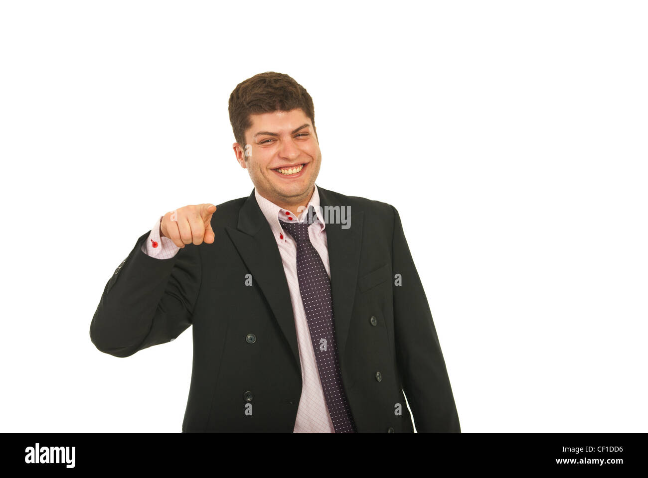 Laughing business man pointing to you isolated on white background ...