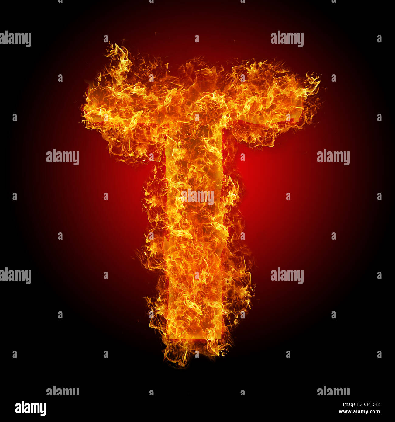 Fire letter T on a black background Stock Photo - Alamy