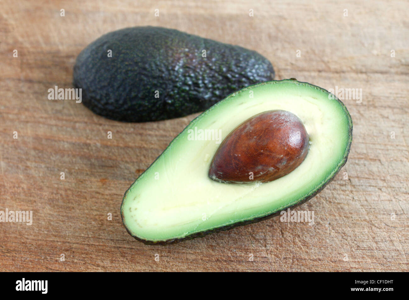 Avocados have green brown purplish or black skin hi-res stock ...