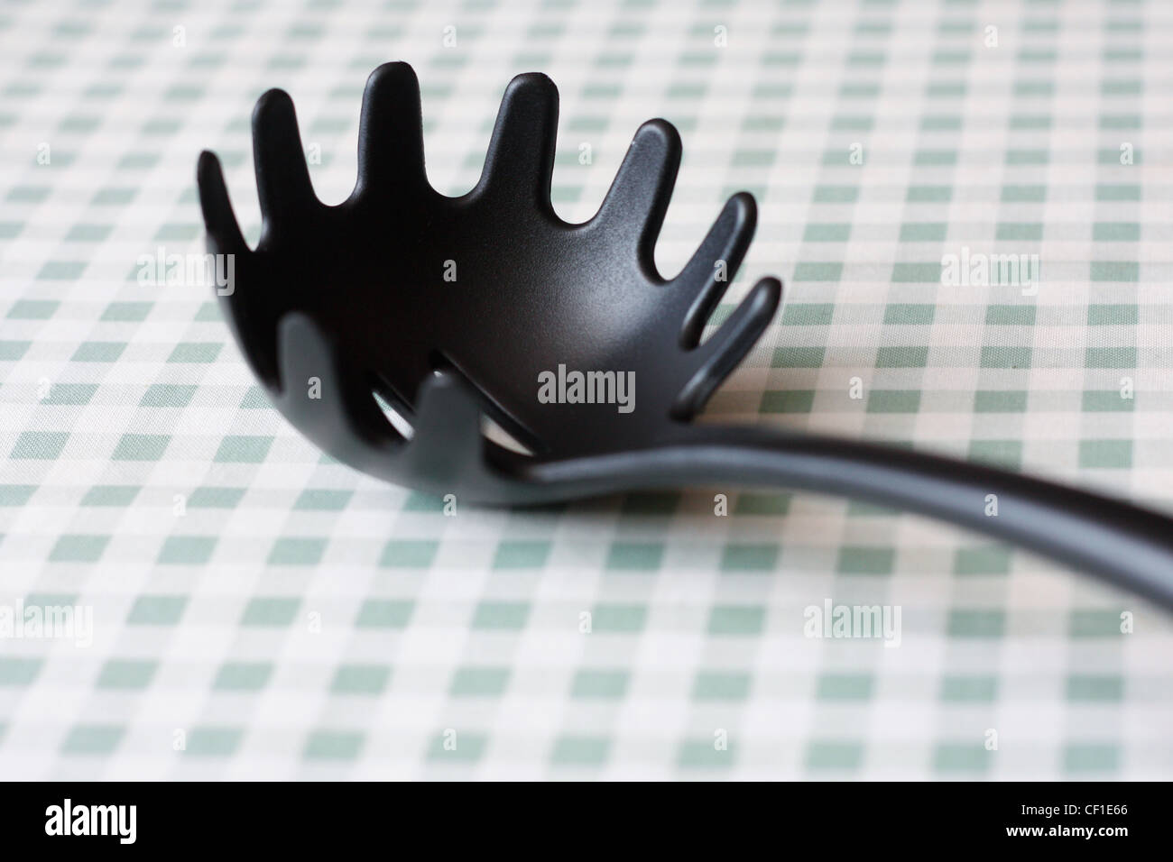 Spoon with hole hi-res stock photography and images - Alamy