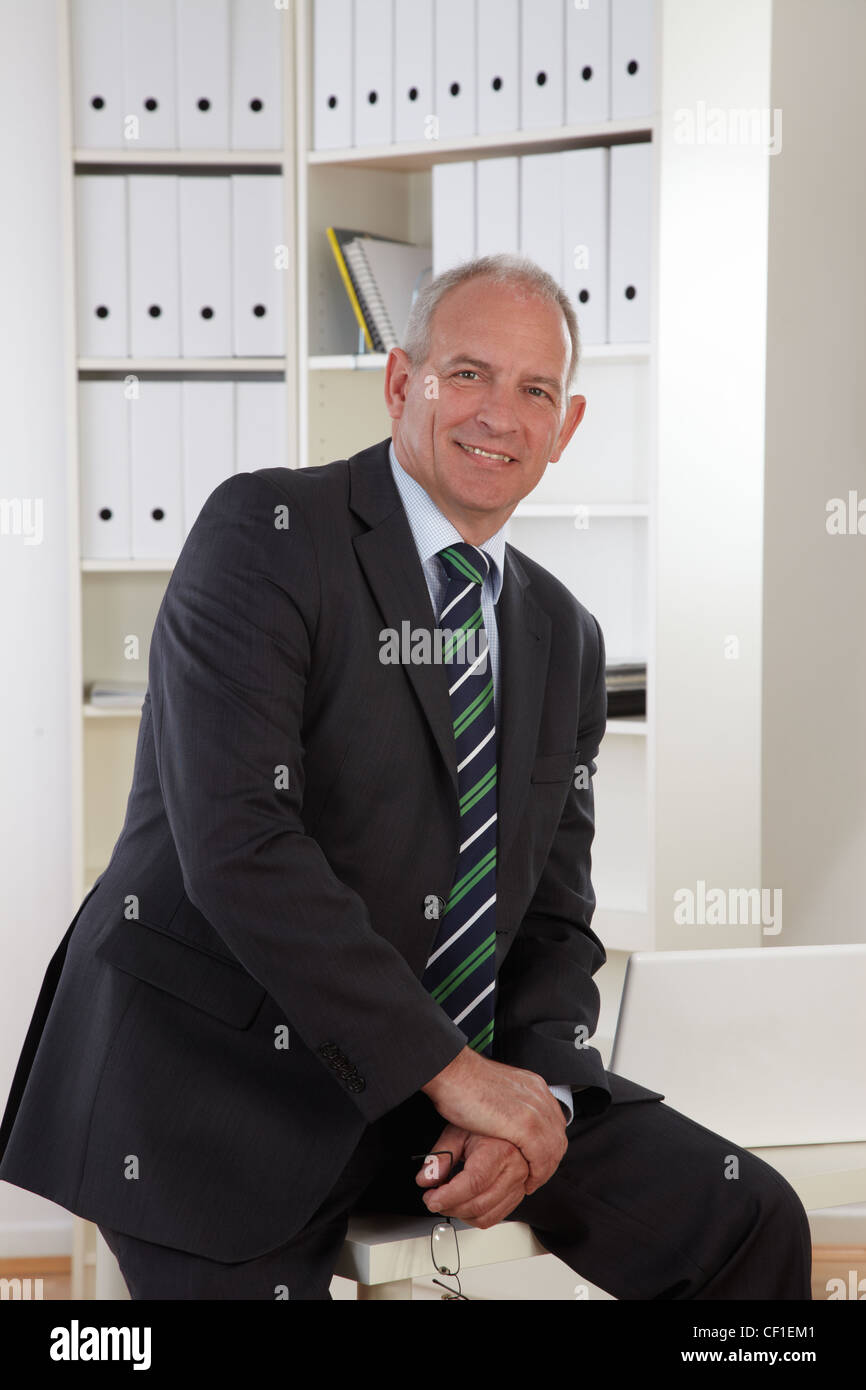 old business man in office Stock Photo - Alamy