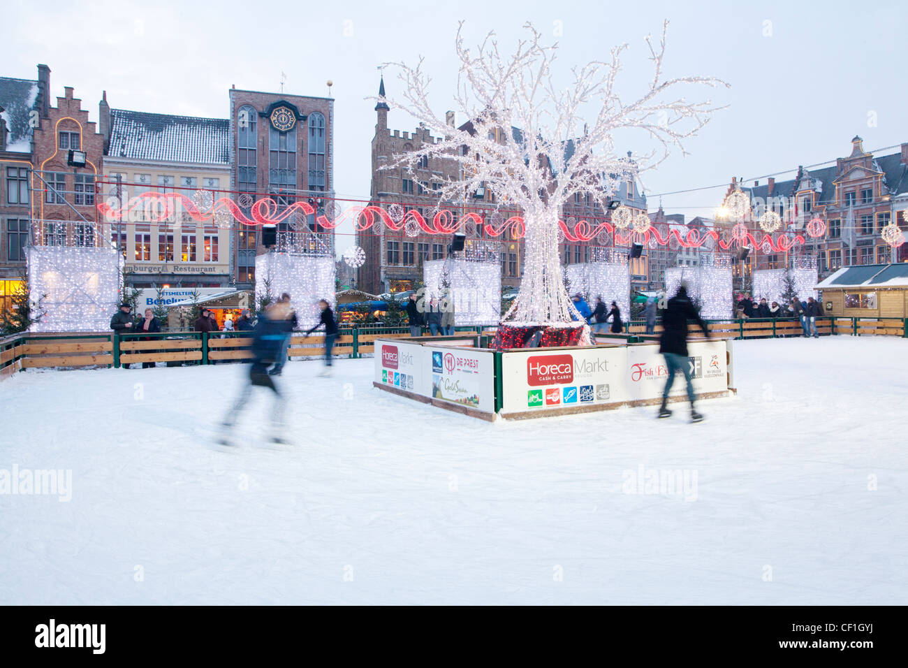 Skaters on the Christmas ice rink in the main square in the centre of ...