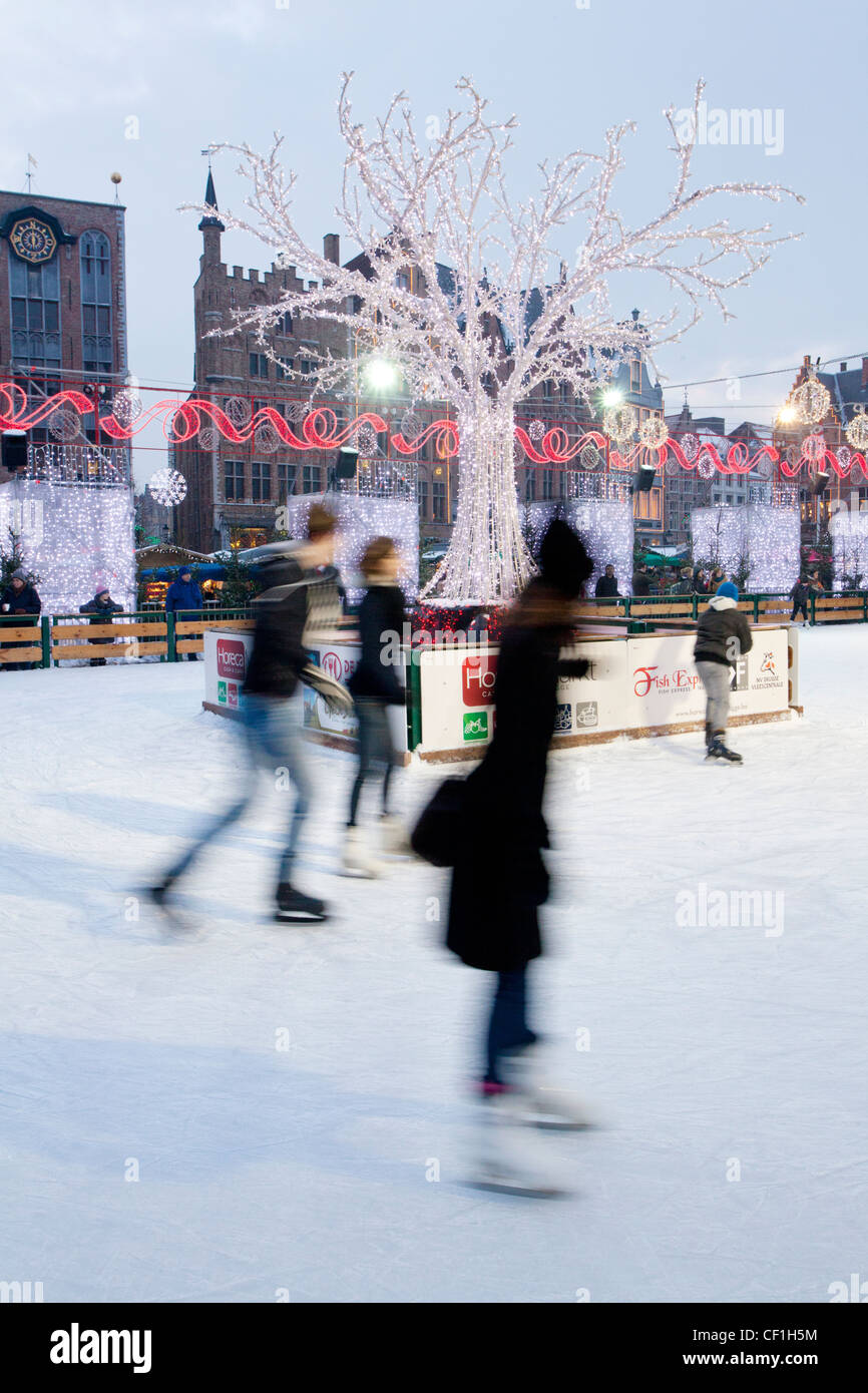 Skaters on the Christmas ice rink in the main square in the centre of ...