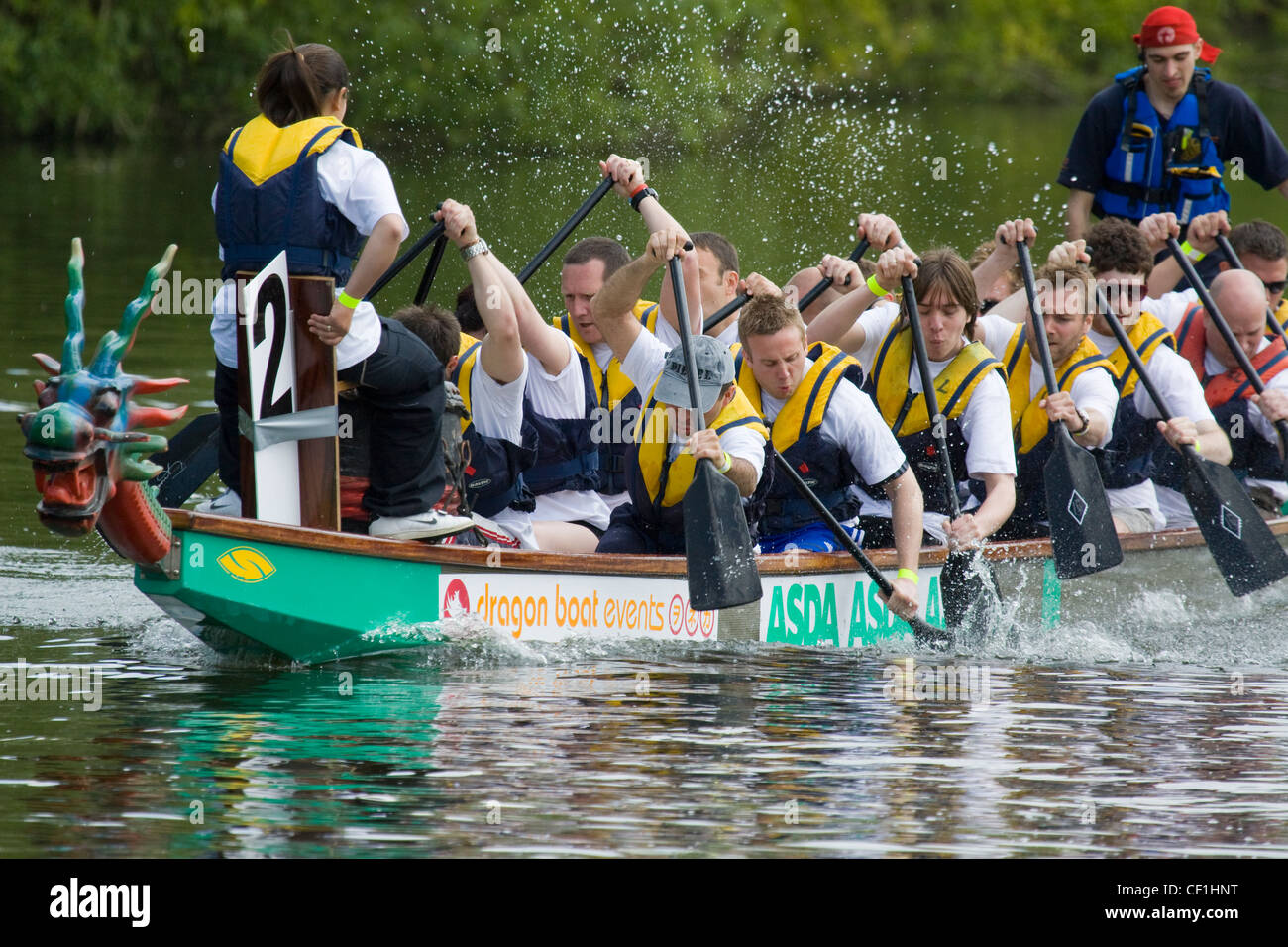 Dragon boat racing at the annual fund raising event on the River Thames ...