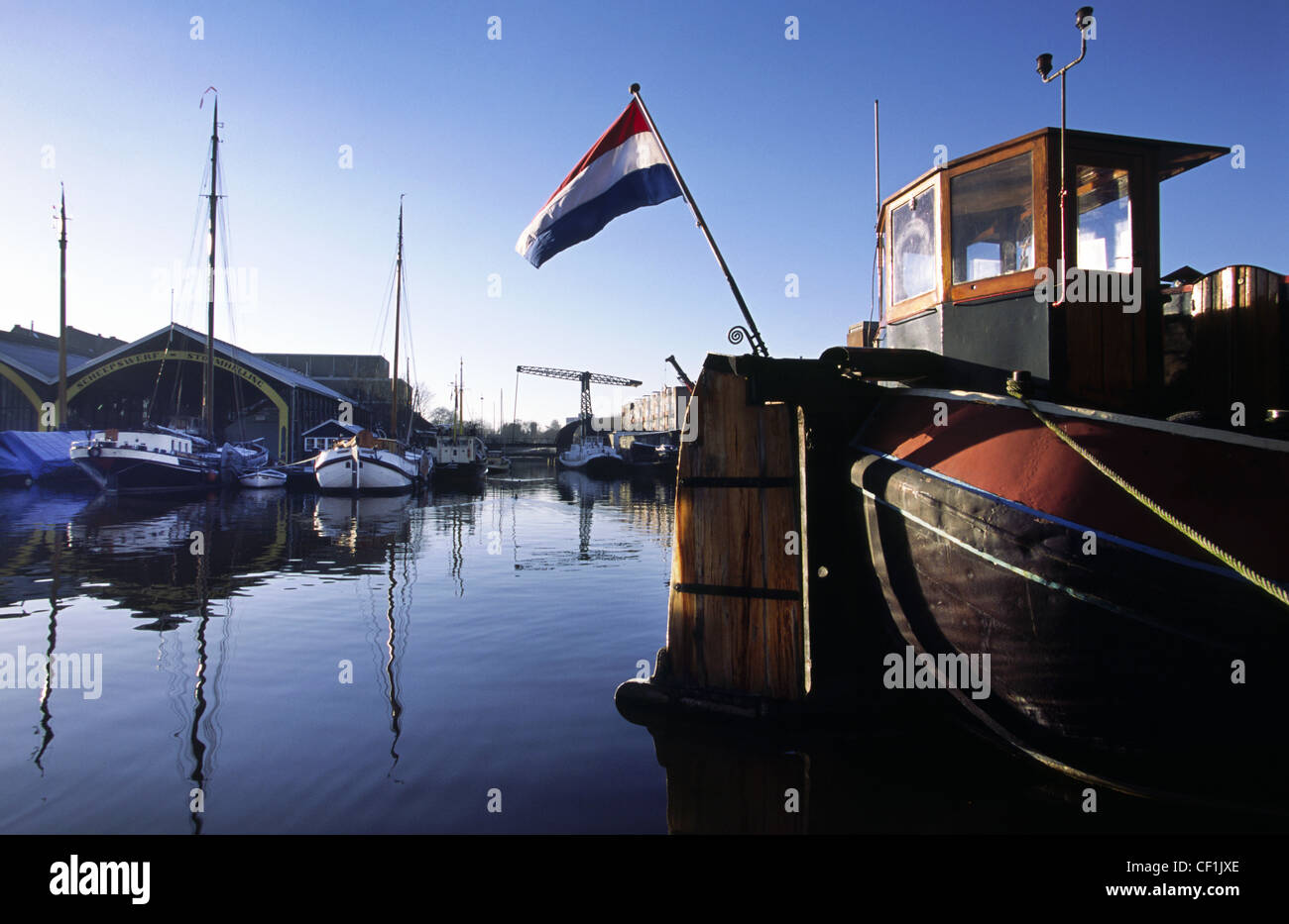 Houseboat holland flag canal hi-res stock photography and images - Alamy