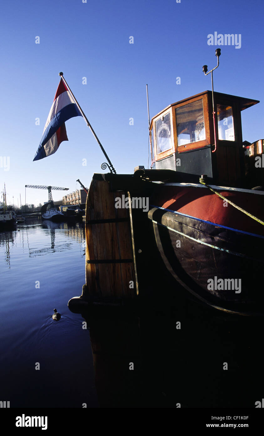Houseboat holland flag canal hi-res stock photography and images - Alamy
