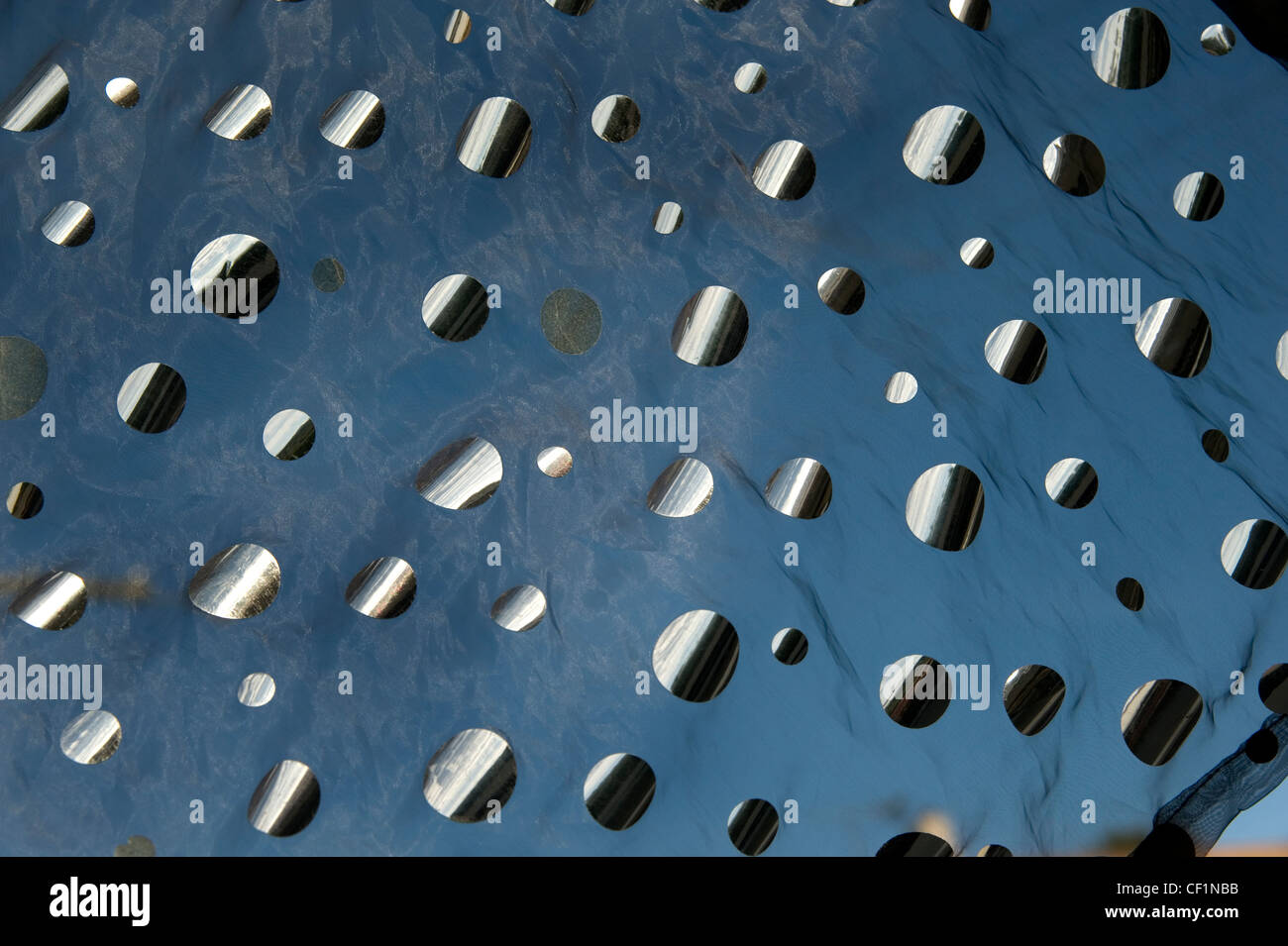 silver dots on blue sky Stock Photo - Alamy