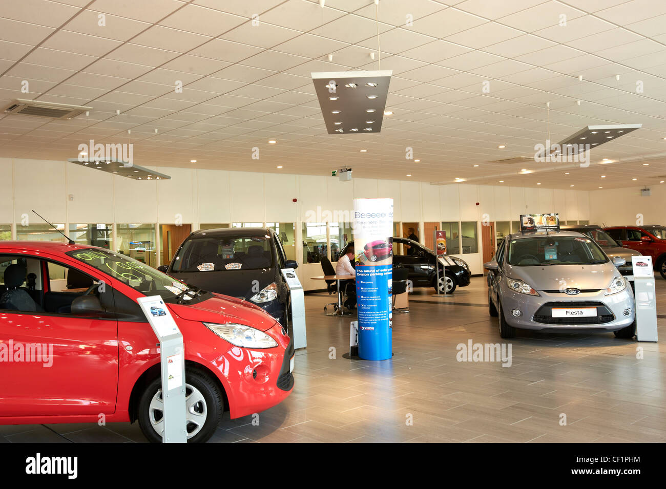 The interior of a car sales room showing areas for customer care Stock ...