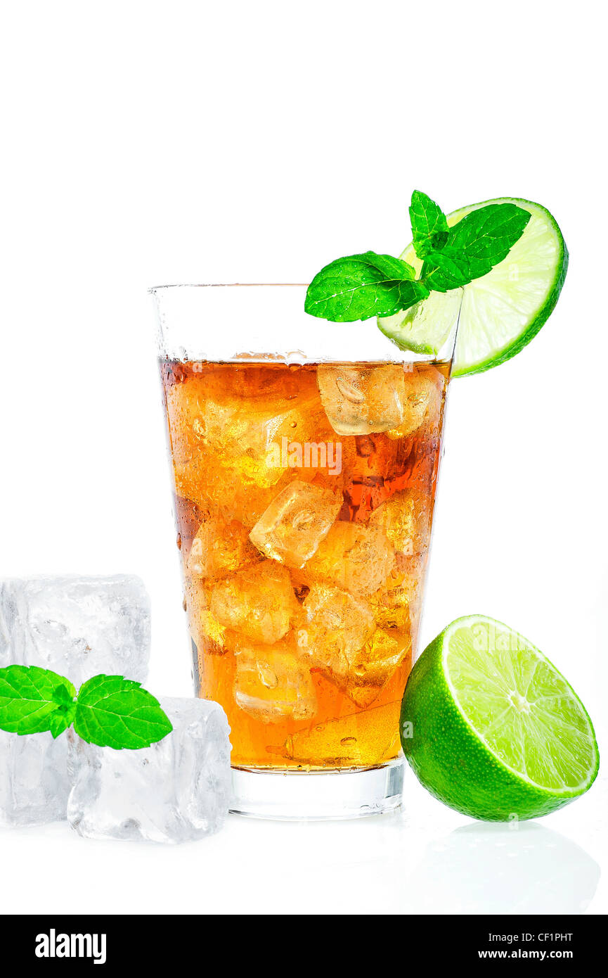 Cold glass of iced tea with ice cubes, fresh mint and lime isolated on ...
