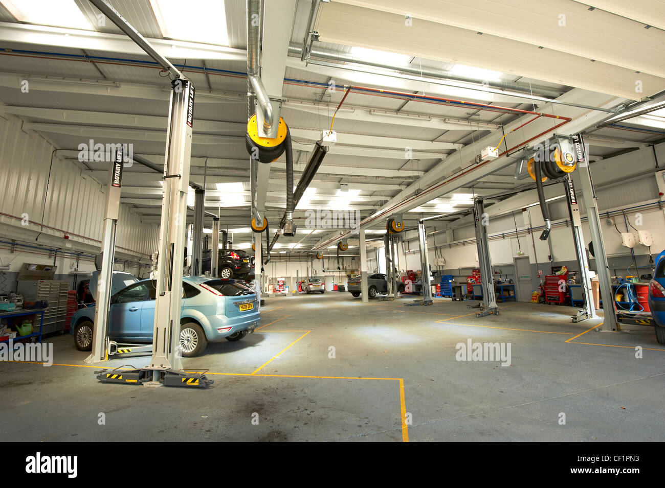 The interior of a modern garage repair centre Stock Photo - Alamy